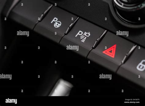 Hand Operating ESP Electronic Stability Program Control Close Up View Interior Detail Of A