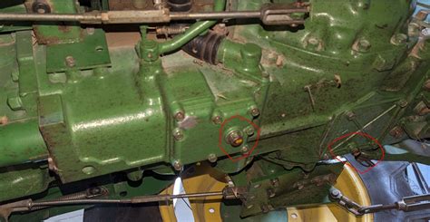 Which One Is The Hydraulic Oil Drain Plug On A John Deere 870 770 970 Green Tractor Talk