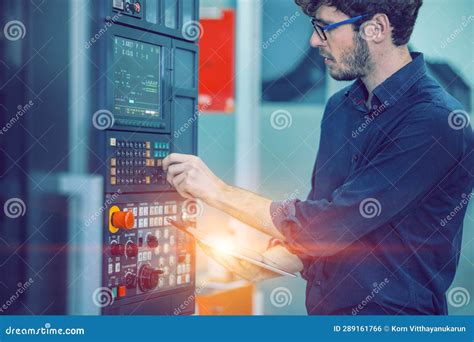 Young Engineer Male Working Service Control Modern Machine In Automation Factory Cnc Metal