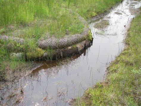 Upper Panel Installation And Backfilling Of Coir Log Flow Constrictor