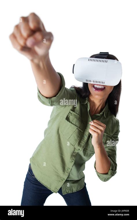 Woman Gesturing While Using Virtual Reality Headset Against White