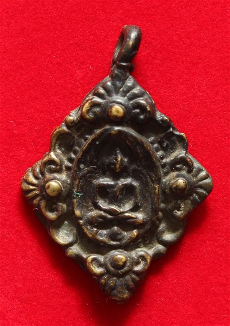 เหรียญหล่อเจ้าสัว พิมพ์ซุ้มดอกพิกุล หลวงปู่บุญ วัดกลางบางแก้ว นครปฐม ปี2462 เนื้อโลหะผสมหลังจาร