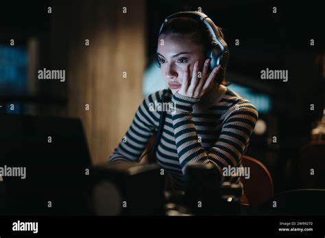 Successful Businesswoman Analyzing Sales Statistics And Planning Project In Corporate Office