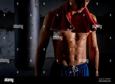 Shirtless Sweaty Man Having Break After Practicing Bodybuidling Stock
