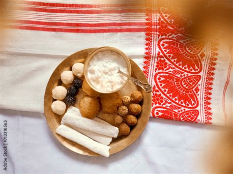 Assamese Traditional Food Items Like Pitha Laddu Doi Sira With