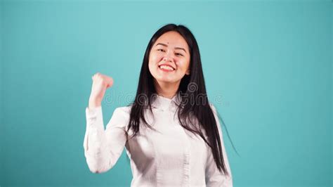Young Happy Asian Girl Looking At Camera Isolated Showing Okay Gesture
