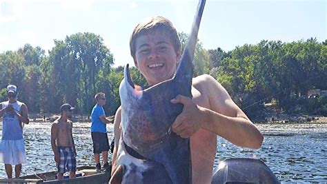Teens Bring In Monstrous Prehistoric Paddlefish