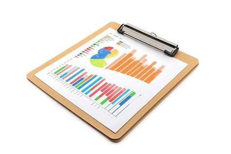 Business Data Analysis On Clipboard With Colorful Charts A Wooden
