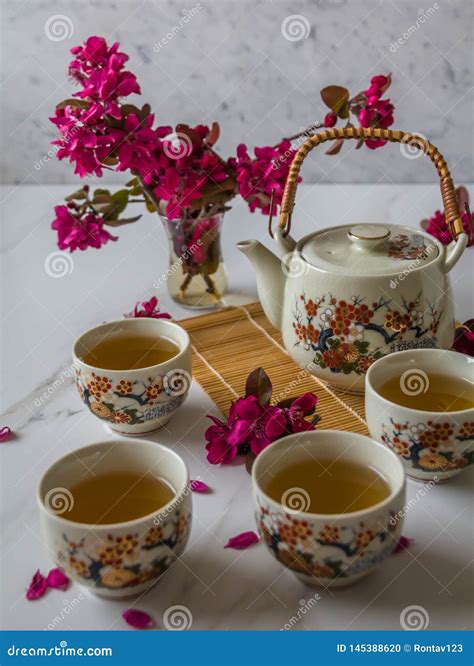 Traditional Cherry Blossom Decorated Japanese Tea Set Filled with Green ...