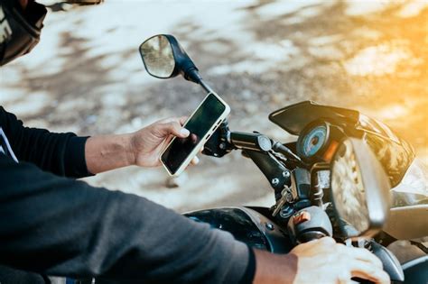 Premium Photo Hands Of Motorcycle Man Texting On The Phone Closeup Of Motorcyclist Texting On