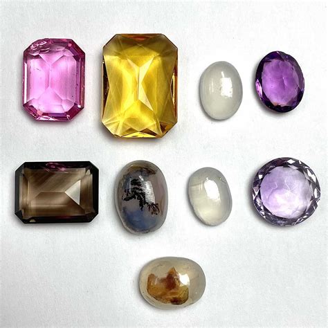 Lot 876 A Collection Of Nine Loose Cut Gem Stones