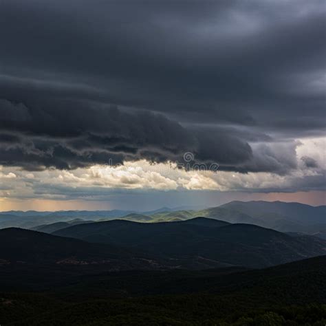 Dramatic Sky With Thick Dark Storm Clouds Hovering Over A Series Of