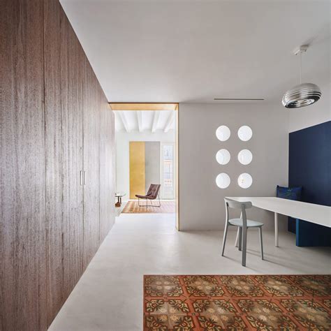 Hiha Studio Breaks Up Linear Apartment Layout With Curved Corridor