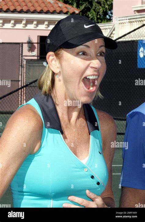 Tennis Legend Chris Evert Warms Up Prior To The Start Of The Chris