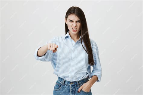 Free Photo Mad Woman Pointing Finger At Front Make Accusation