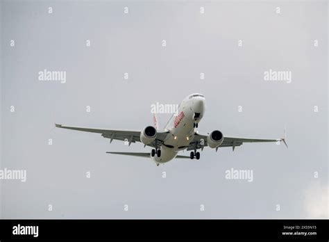 A Logo On The Side Of A Airplane Boeing 737 Landing At East Midlands Airport Stock
