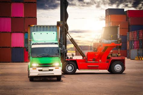 Container Crane Tractor Unloading Container Box From Trailer Handling Of Logistics