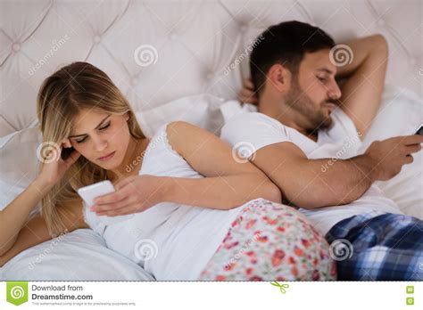 Couples Issues With Technology Addiction Stock Image Image Of Bedroom