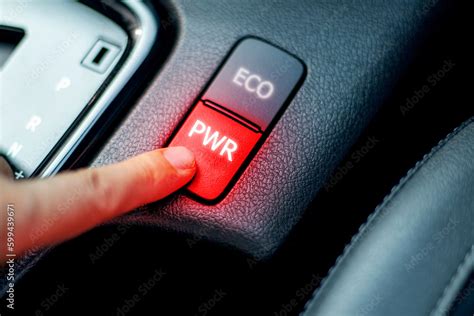Hand Pushing Button In Power Mode The Boost Button Accelerates The Engine S Power To Respond