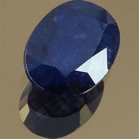 خرید و قیمت نگین تک یاقوت آفریقایی کبود کد 64890 زمان ساخت این