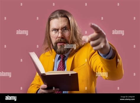 Bearded Man Pointing Book Hi Res Stock Photography And Images Alamy