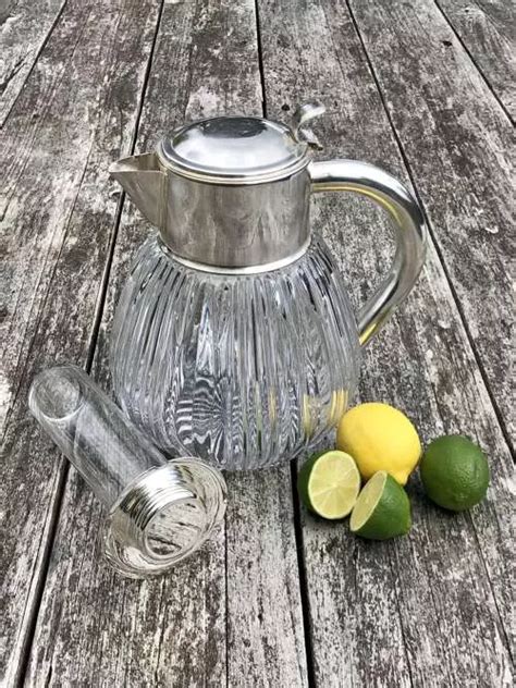 Silver Plated And Crystal Cooling Jug In Antique Serveware