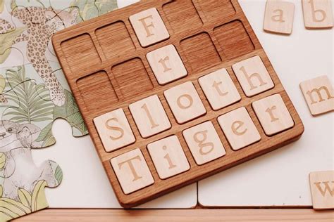 reversible alphabet board with 2 lowercase letters set extra holding