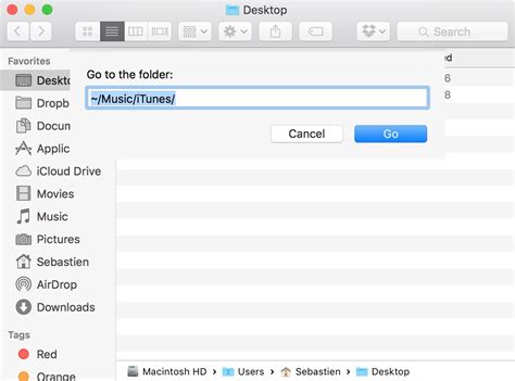 how to sync an iphone with multiple itunes libraries