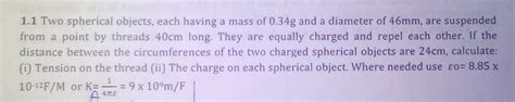 Solved 11 Two Spherical Objects Each Having A Mass Of 034 G And A