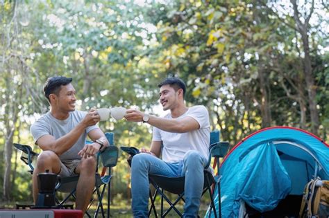Premium Photo Male Gay Couple Asian Traveling With Tent Camping Outdoor And Various Adventure