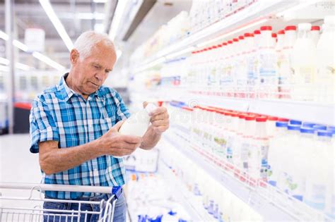 Old Age Man Choosing Milk In Supermarket Stock Image Image Of Gray Market