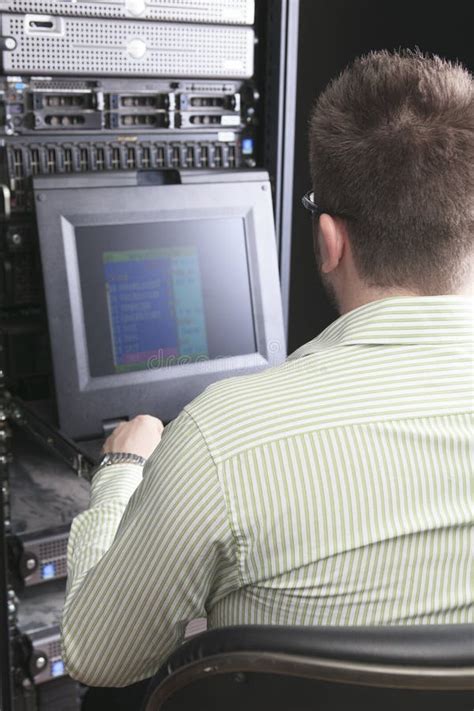 Network Engineer Working In Server Room Stock Image Image Of