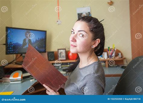 Girl Working On A Desktop Computer At Home A Freelancer At Home