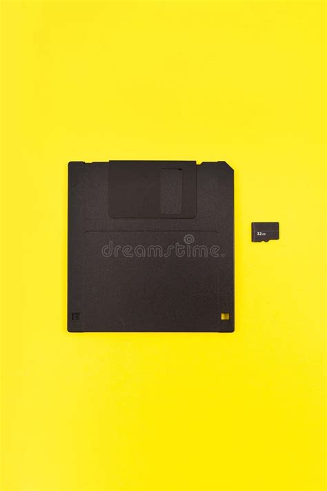 Comparison Between Old Floppy Disk And Micro Storage Card Stock Photo Image Of Archive