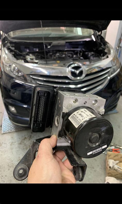 Mazda Biante Abs Pump Module Repair And Installation And Brake Oil Car Accessories Car Workshops