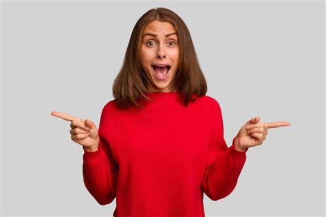 Premium Photo Pointing To Different Copy Spaces Choosing One Of Them Showing With Finger