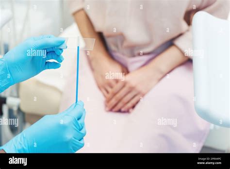 Woman Having Test For Sexually Transmitted Disease With Doctor Stock Photo Alamy