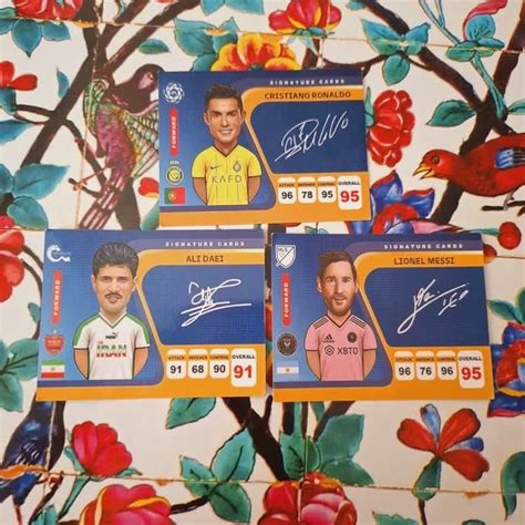 خرید و قیمت کارت فوتبالی کیمدی لیونل مسی و کریستانو رونالدو و علی دایی