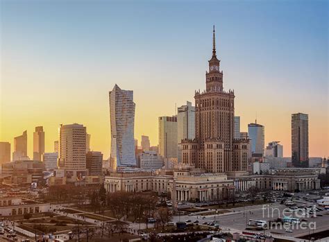 Palace Of Culture And Science And City Centre Skyline At Sunset