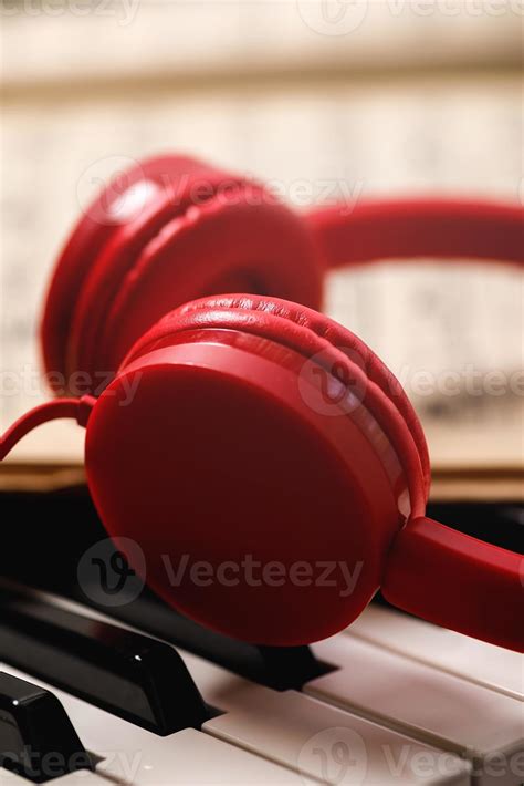 Closeup Of Red Headphones Over Synthesizer Keyboard 16251403 Stock