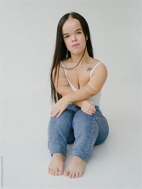 Young Dwarf Woman With Tattoo By Stocksy Contributor Roman Shalenkin Stocksy