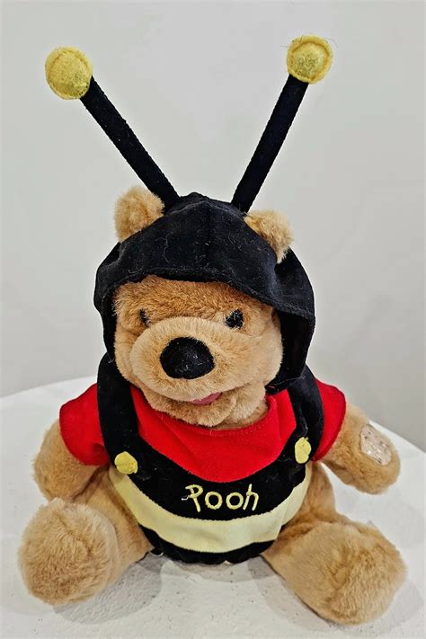 Walt Disney Genuine Winnie The Pooh Dressed In A Bee Costume Plush Toy