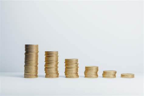 Premium Photo Stacked Golden Coins Chart On White Background With