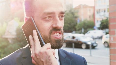 Premium Photo Young Man Using Mobile Phone