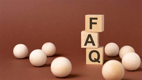 Premium Photo Faq Frequency Asked Questions Letter Pices On The Wooden Cubes Brown Background