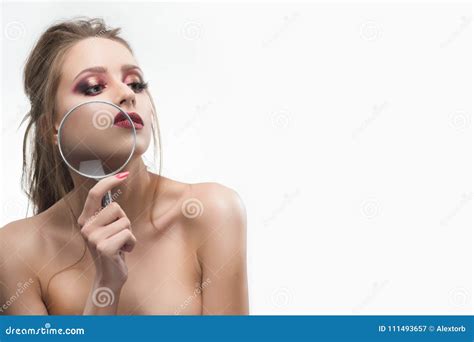 Beautiful Naked Shoulders Girl Shows An Enlarged With A Magnifying Glass Her Healthy Skin On Her