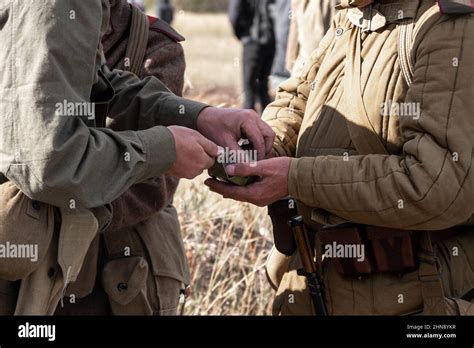 Soldiers In Soviet Uniforms Share Cartridges Matches Cigarettes From