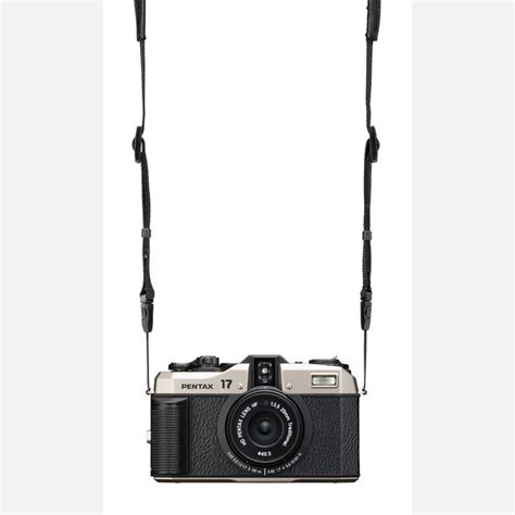 Compact Film Camera With Fixed Focal Length Designed To Capture Half