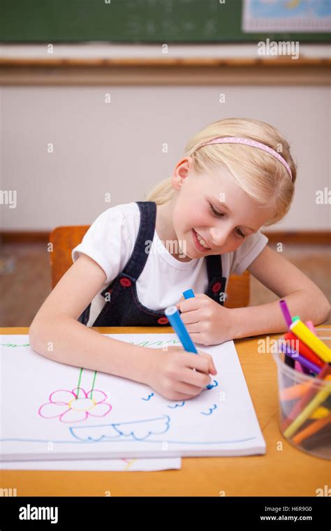 Portrait Of A Girl Drawing In A Classroom Stock Photo Alamy