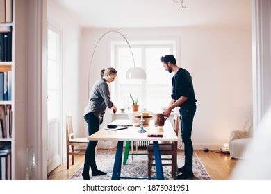 Side View Couple Arranging Objects On Stock Photo 1875031951 Shutterstock